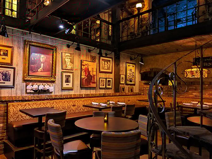History hangs on these walls alongside vintage photographs. Each table feels like your own private dining room in a century-old story.