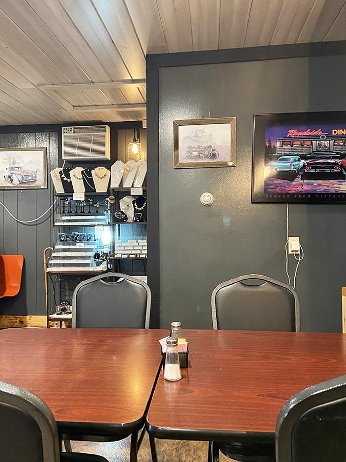 Nostalgic diner décor that doesn't feel manufactured or forced. Those framed pictures on the wall aren't just decoration—they're the community's photo album.