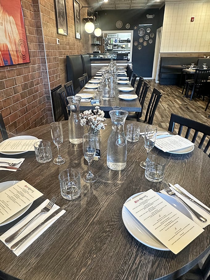 The communal table setup – where strangers become friends over shared plates and the mutual understanding that calories don't count when the food's this good.