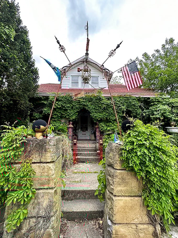 The home's entrance stands like a portal between worlds – ordinary suburban life on one side, stone-laden wonderland on the other.