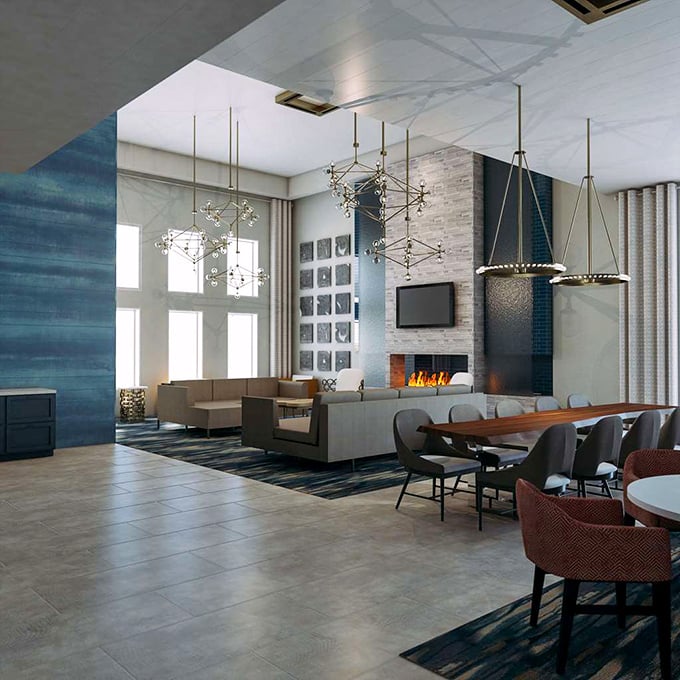 Modern coastal elegance meets homey comfort in this gathering space. Retirement living doesn't mean sacrificing style—it means having time to enjoy it.