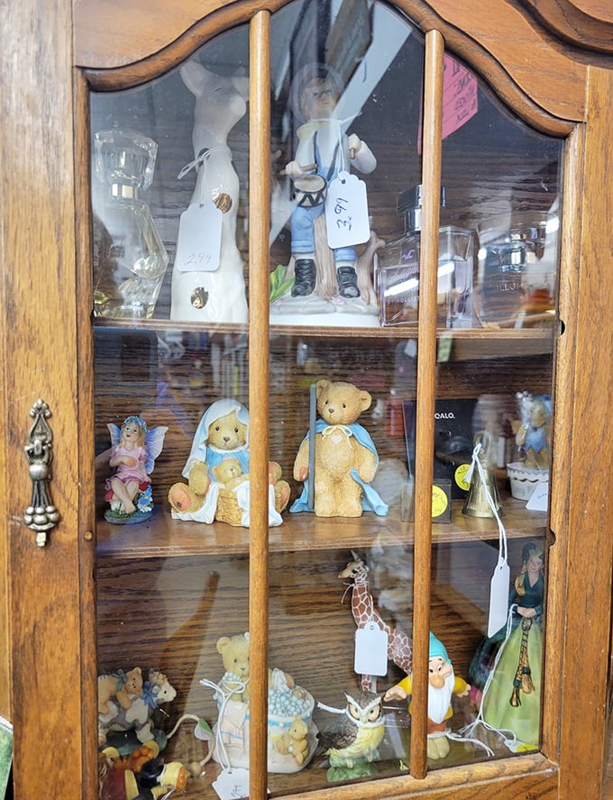Cabinet of curiosities featuring porcelain treasures. Each figurine represents someone's once-cherished collection, now awaiting a new admirer's shelf.