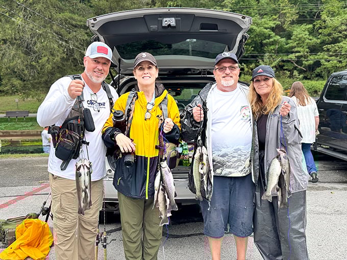 The ultimate trophy shot – proud anglers display their rainbow trout bounty, evidence that patience and the right fly can lead to dinner bragging rights.