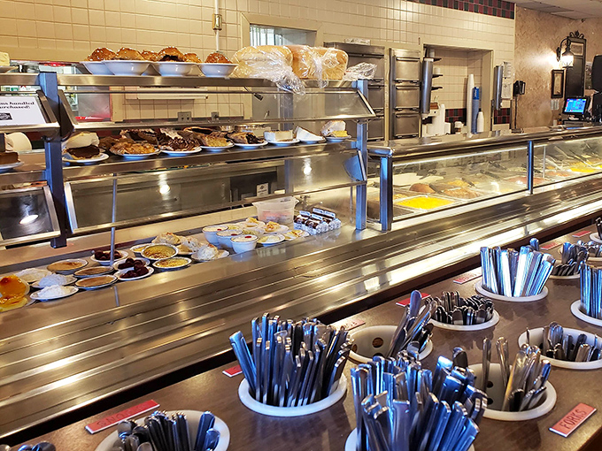 The dessert case displays its treasures behind glass, each pie and cake a sweet siren calling your name.