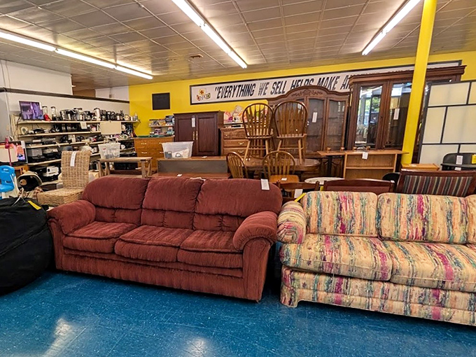 Living room time capsules await new families. That burgundy sofa has absorbed countless naps, movie nights, and probably a spilled glass of merlot or two.