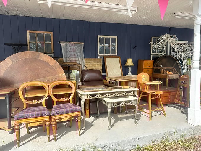 Outdoor furniture showcase that's part yard sale, part design inspiration. That headboard could become your next conversation-starting garden feature.