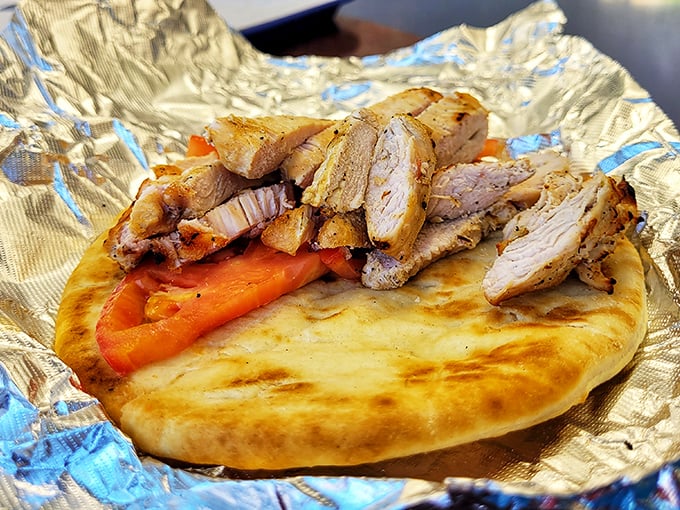 The chicken gyro – where Mediterranean meets Midwest in a handheld vacation from your everyday sandwich routine.
