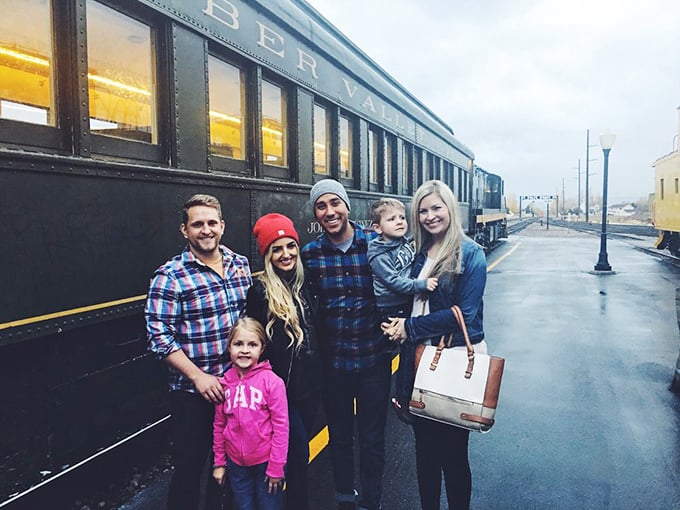 Families creating memories that will outlast any theme park selfie—the universal language of "all aboard" brings generations together.