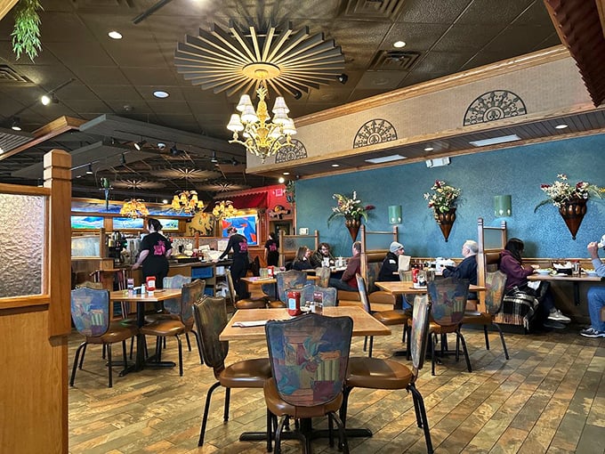 The dining room's sunburst ceiling details aren't just decorative—they're like a spotlight focusing your attention on the real star: what's on your plate.