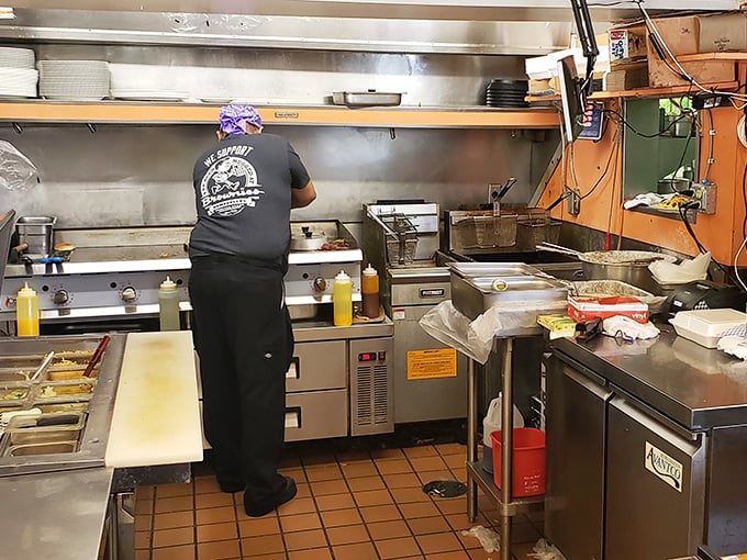 The kitchen at Brownie's isn't designed for show—it's a functional workshop where burger artisans have been perfecting their craft since Eisenhower was president.