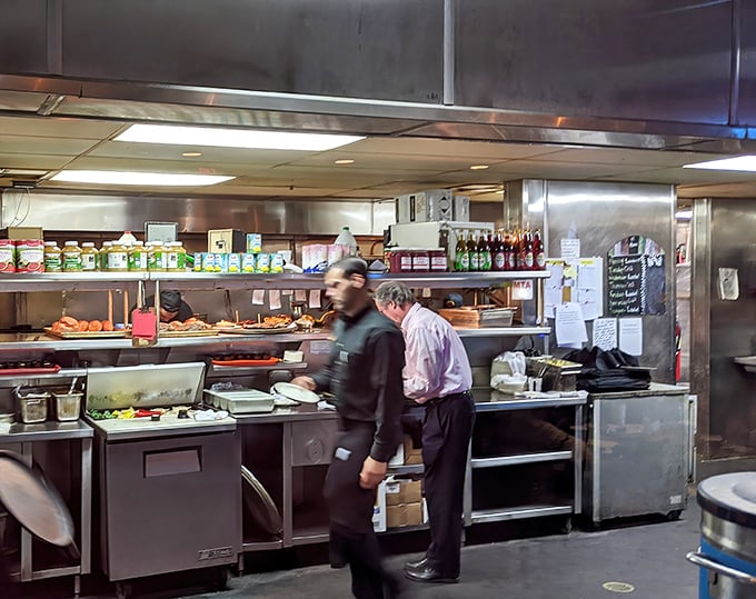 Behind the scenes where the magic happens—a glimpse into the orchestrated chaos that transforms raw ingredients into memorable meals.