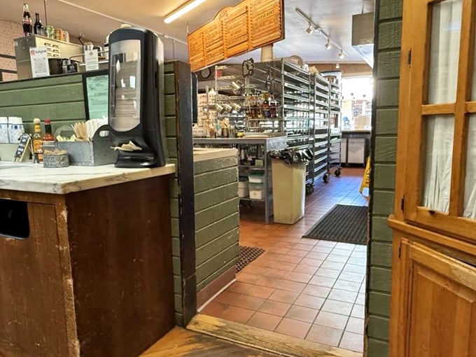 Behind the scenes where the magic happens – racks of freshly baked pies waiting for their moment in the spotlight.