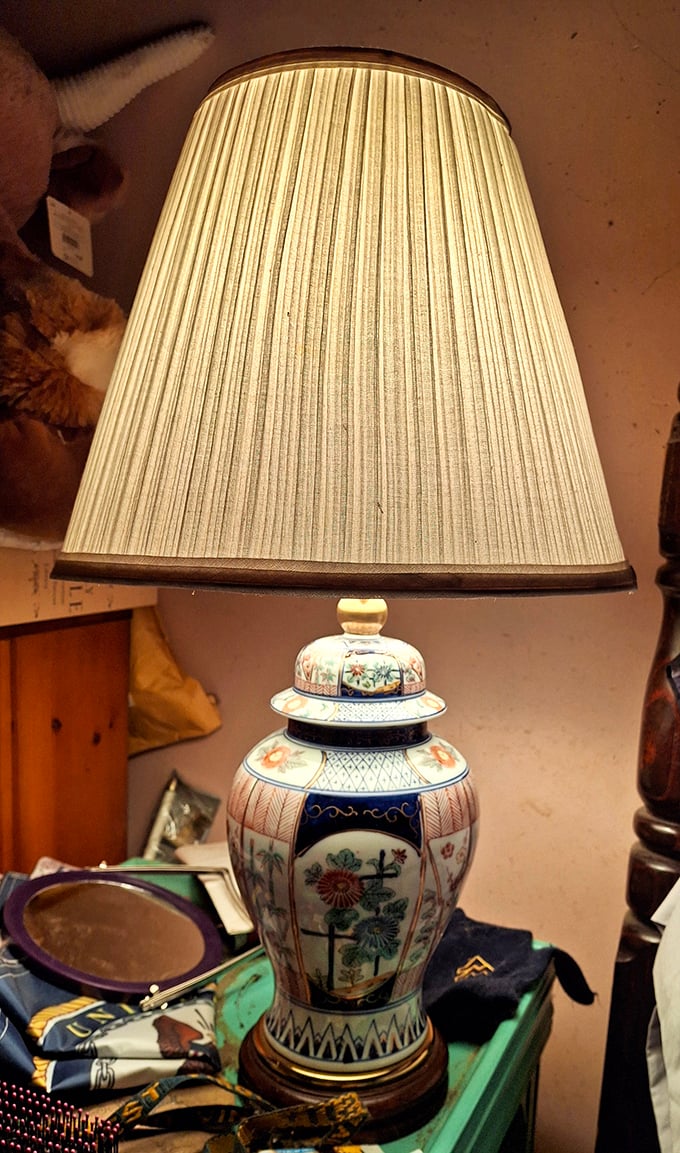 This elegant lamp probably cost someone a fortune originally but now awaits rescue at a fraction of its former glory.