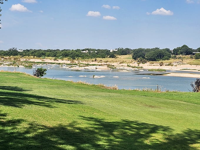 Golf courses rarely come with river views this spectacular—where every slice into the water is almost worth the penalty.