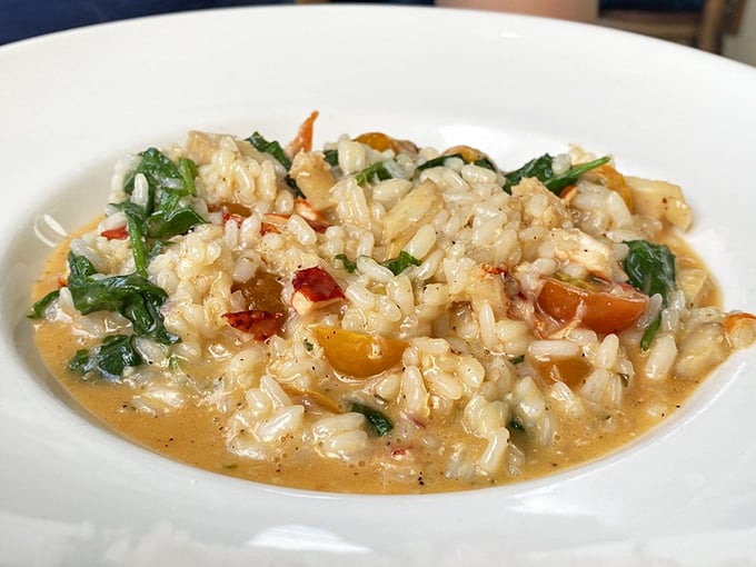 Risotto that whispers sweet nothings to your taste buds—creamy rice cradling tender morsels of lobster in each luxurious spoonful.