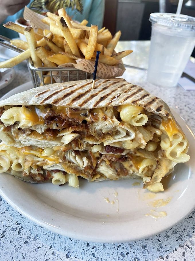 Not all heroes wear capes—some come as mac & cheese stuffed into a grilled wrap that makes your childhood self high-five your adult self.