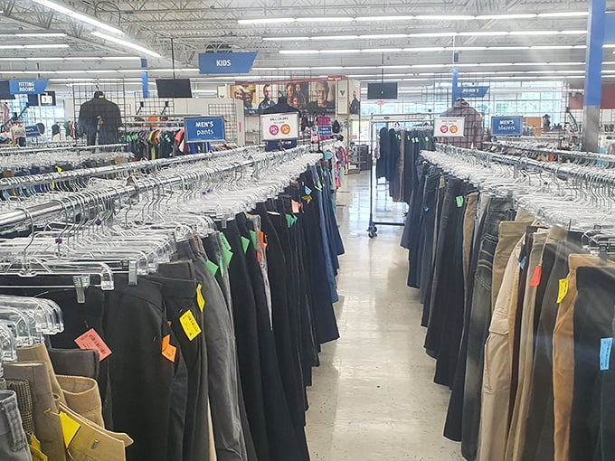 Men's pants section: organized chaos at its finest. The holy grail of thrifting—finding designer jeans that fit perfectly on the first try.