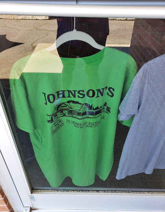Johnson's merchandise proudly displays 75 years of excellence—the t-shirt equivalent of a burger trophy that locals wear with pride.