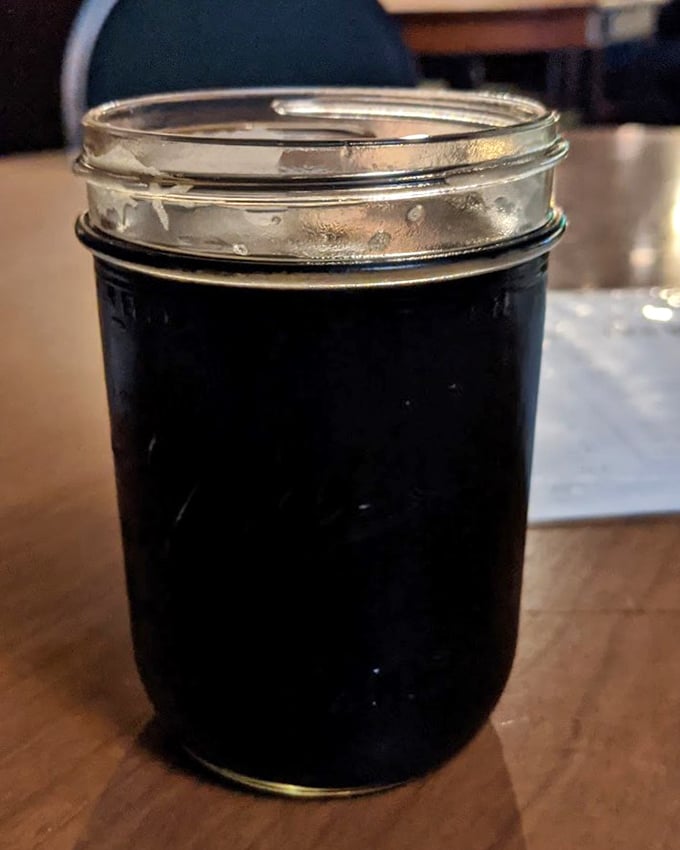 This stout isn't just dark—it's mysteriously opaque, like the night sky before stars appear, promising deep flavors that coffee lovers will appreciate.