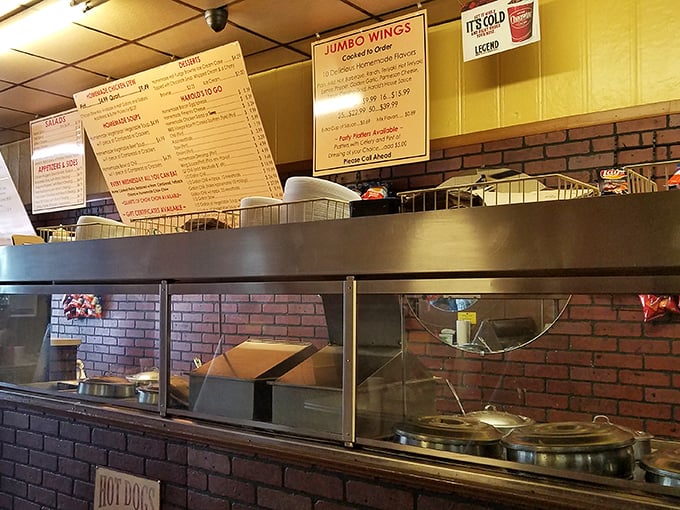 The counter and kitchen area showcase the no-frills approach that's kept Harold's thriving—good food doesn't need fancy surroundings.
