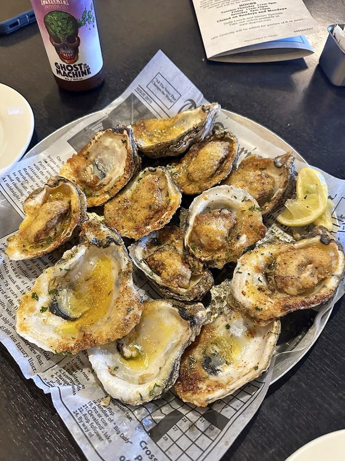 These chargrilled oysters aren't just appetizers – they're little miracles of butter, cheese, and flame that make you wonder why you'd eat oysters any other way.
