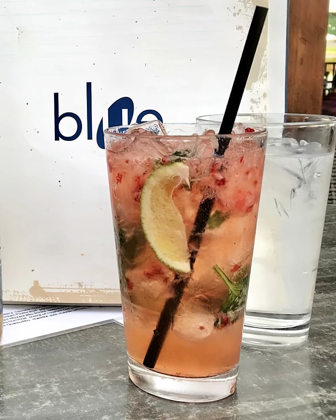 This isn't just a cocktail – it's summer in a glass, with fresh mint and lime playing supporting roles to the star attraction.