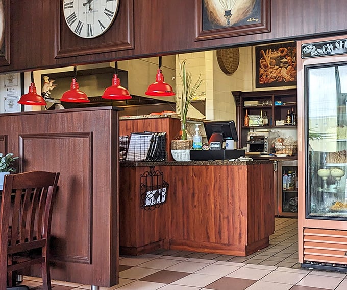 Where diner magic happens—red pendant lights illuminate the heart of this beloved Melbourne institution.