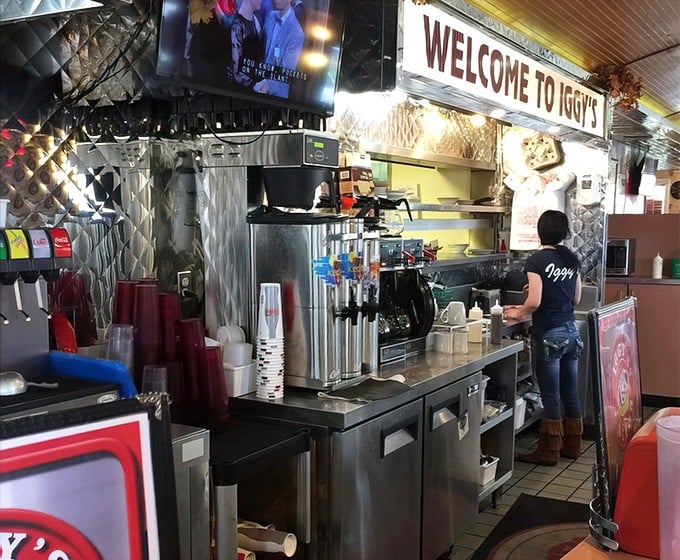 "Welcome to Iggy's" isn't just a sign—it's a promise that you're about to experience what happens when breakfast is taken seriously. That stainless steel backdrop means business.