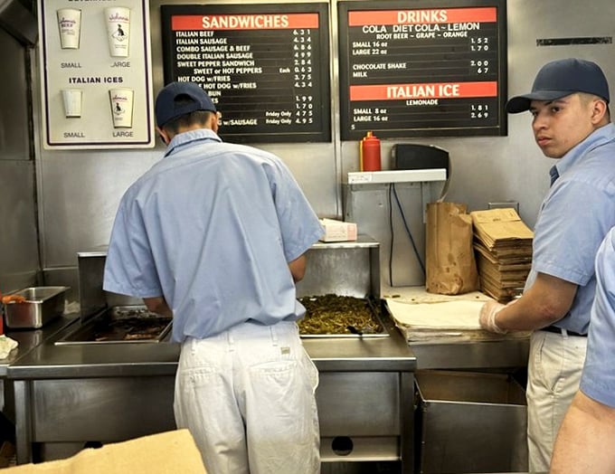 Where the magic happens—a glimpse into the preparation area reveals the choreographed efficiency that keeps the beef flowing.