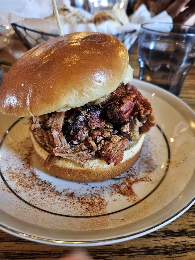 The pulled pork sandwich is messy, magnificent, and exactly what you came here to find on a bun.