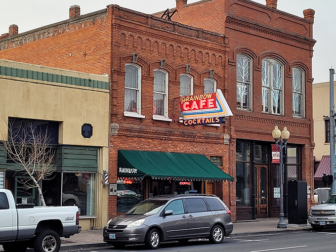 The Rainbow Café's vintage neon sign has been guiding hungry travelers to comfort food since long before GPS told us where to eat.