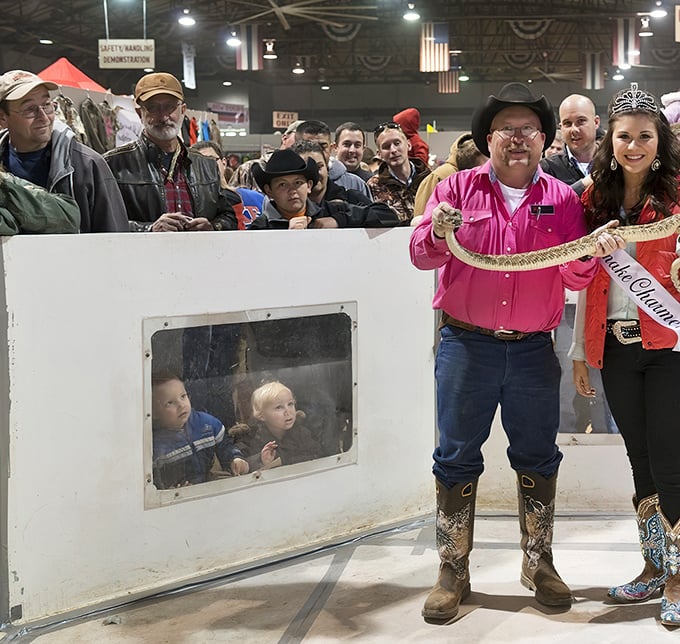 At the Rattlesnake Roundup, that's not a belt or a boot yet—it's a local celebrity meeting its adoring (and slightly terrified) public.
