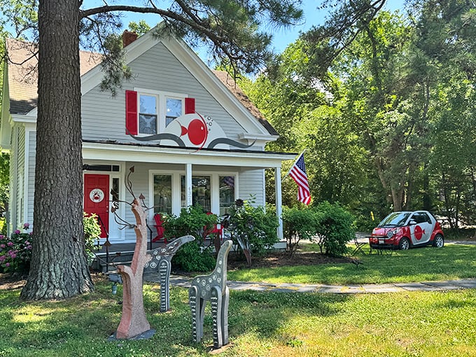The Red Fish Gallery's playful facade and artful yard sculptures announce that creativity thrives in this waterfront community.