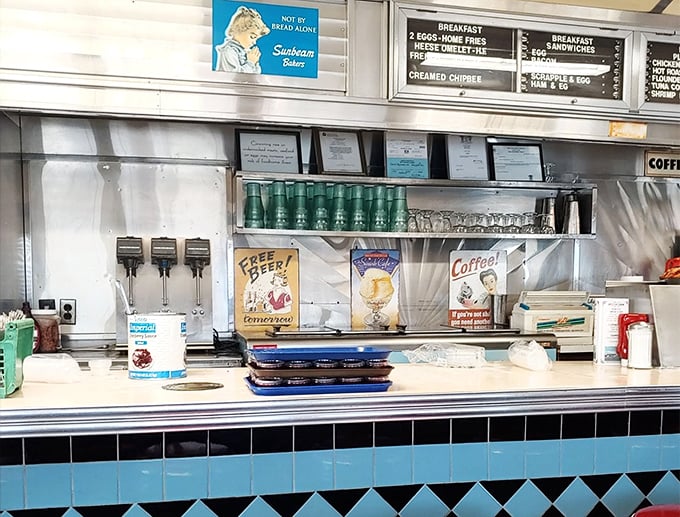 Vintage coffee signs and a blue-tiled counter transport you to simpler times when "tweet" was just something birds did.