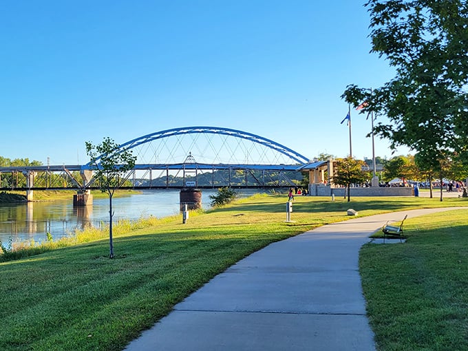 Atchison's riverwalk and bridge create a postcard-perfect scene where daily strolls come with views that elsewhere would cost a premium.