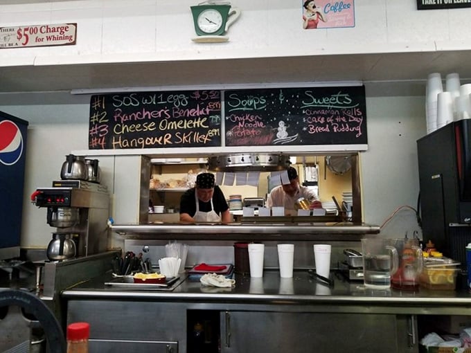 The pass-through window: where breakfast dreams materialize and servers perform the daily miracle of remembering who ordered what.