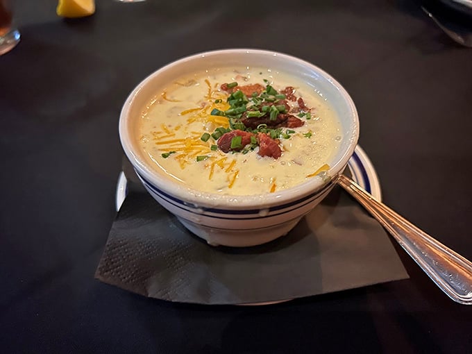 This isn't just soup; it's a warm hug in a bowl. Topped with cheese, bacon, and green onions, it's comfort that refuses to be simple.