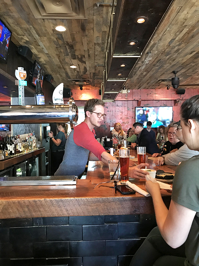 Where the magic happens—The Eagle's bar is command central for an impressive array of local brews and cocktails that complement that famous fried chicken.