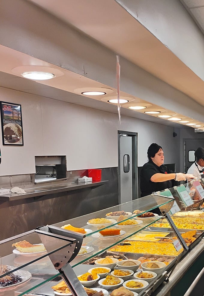 Behind the counter, skilled hands portion out decades of culinary tradition, one scoop at a time.