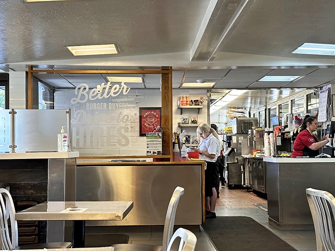 The staff area gleams with stainless steel efficiency. Like a burger symphony, every station plays its part in the delicious harmony.