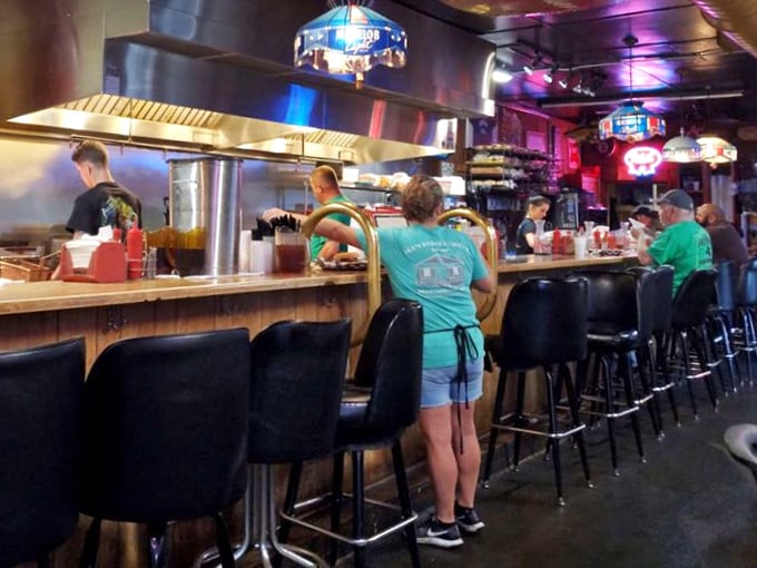 Where burger magic happens – the staff works with the practiced efficiency that comes only from years of perfecting their craft.