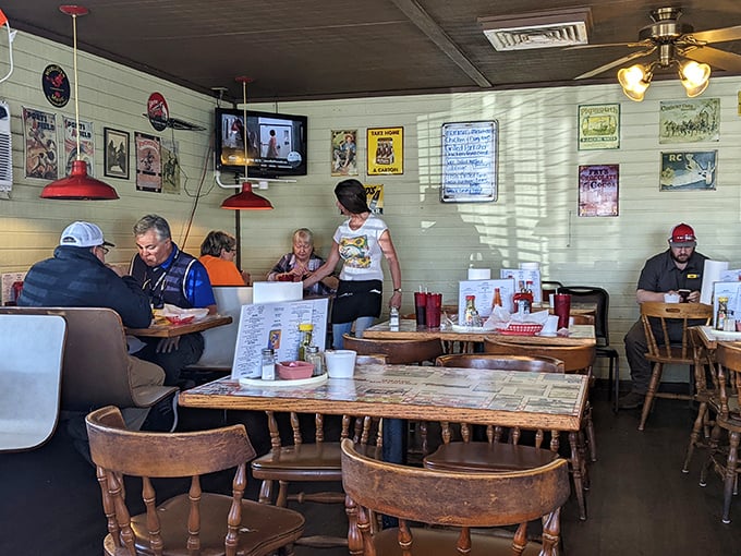 The dining room buzzes with the energy of regulars and first-timers alike, all united in the universal language of "pass the hot sauce."