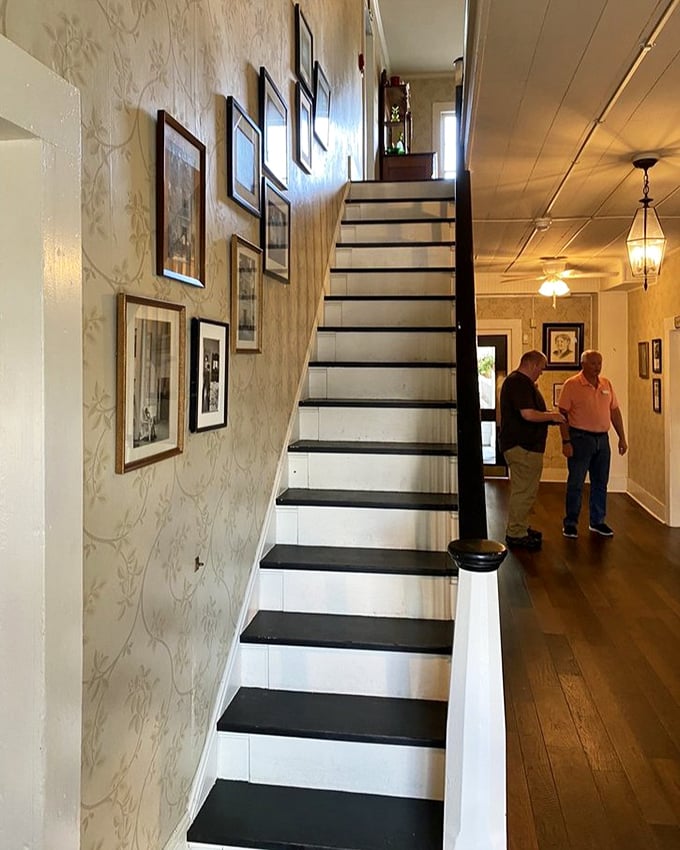 Staircases tell stories in old houses. This one whispers of generations who've climbed these steps with full hearts and even fuller bellies.