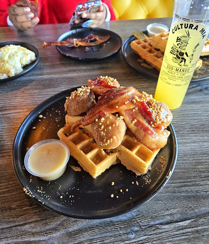 Waffles topped with chicken and bacon—because sometimes more is more, and breakfast should feel like a celebration.