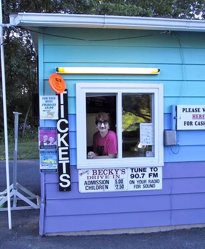 "Tickets, please!" The cheerful blue booth where movie magic begins and wallet-friendly prices keep family traditions alive.