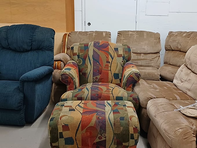 The furniture section's abstract masterpiece—a chair that's part Picasso, part comfy lounger, all conversation starter. Paired with its matching ottoman for maximum impact!