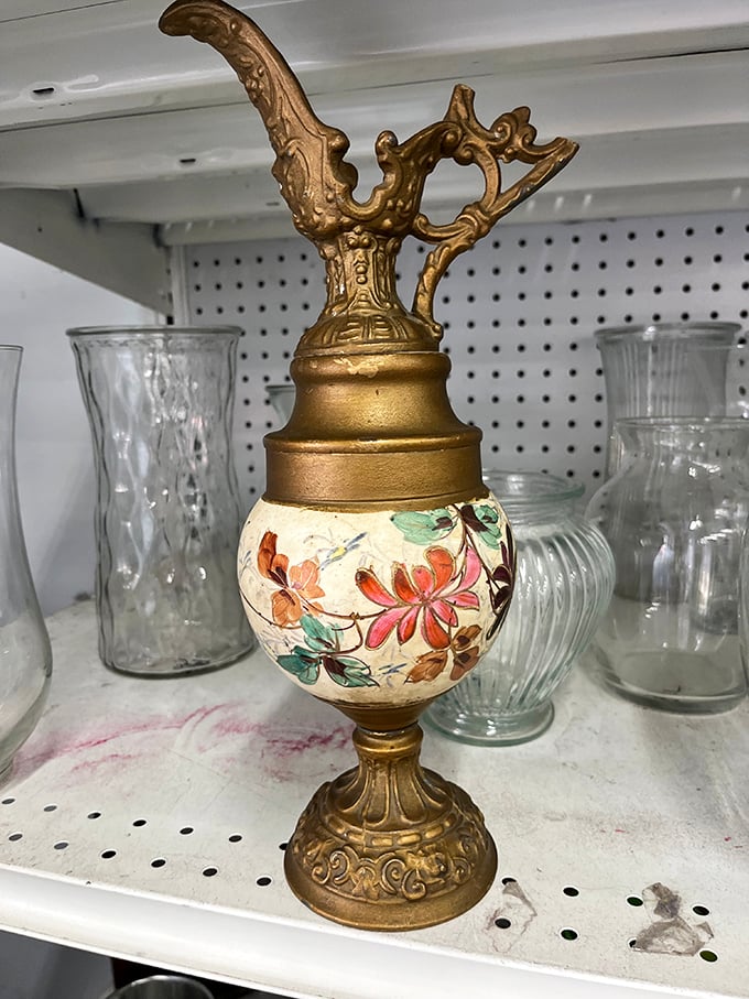 Victorian elegance meets thrift store pricing. This ornate golden pitcher once poured tea for guests who arrived by horse and carriage.