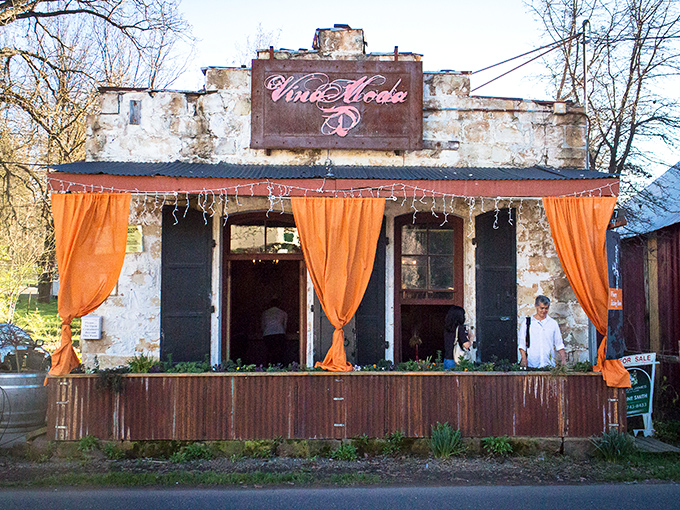 Vina Moda's rustic tasting room with bright orange curtains shows that serious wine doesn't require serious pretension.
