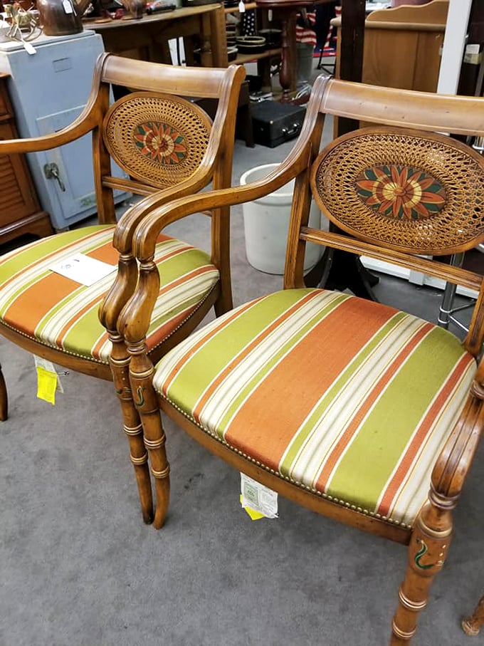 These carved armchairs with caned medallions aren't just seating—they're thrones for your Sunday morning coffee ritual.
