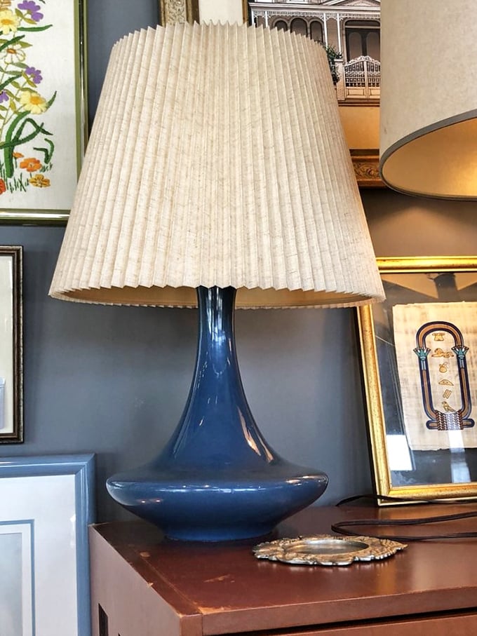 This mid-century blue lamp doesn't just illuminate—it makes a statement. The kind of vintage find that design shows build entire rooms around.
